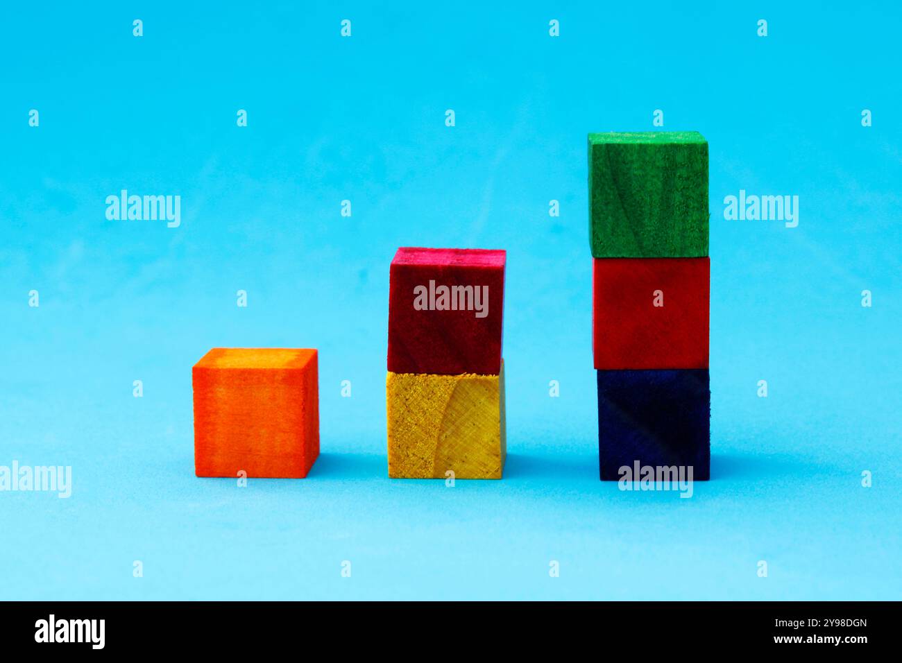 Bar graph made of colorful wooden cubes Stock Photo - Alamy