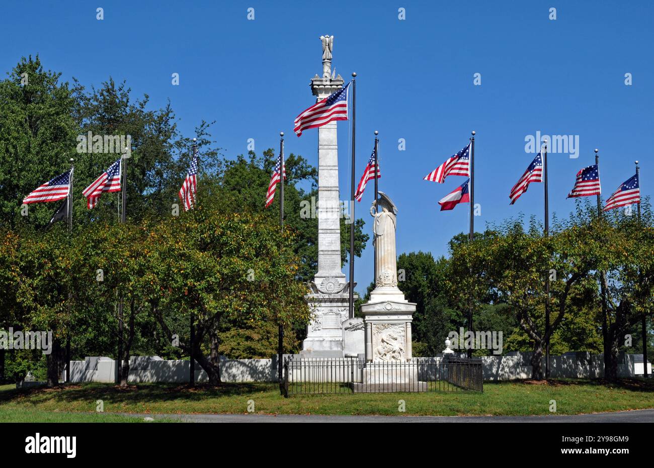 The tall Kentucky War Memorial stands behind the grave of American Vice ...