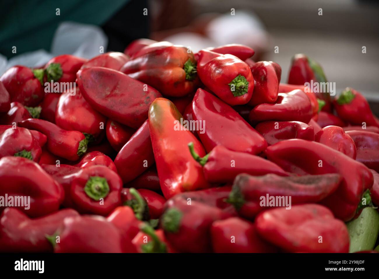 sweet red bell pepper displayed on a farmer's market counter Stock ...