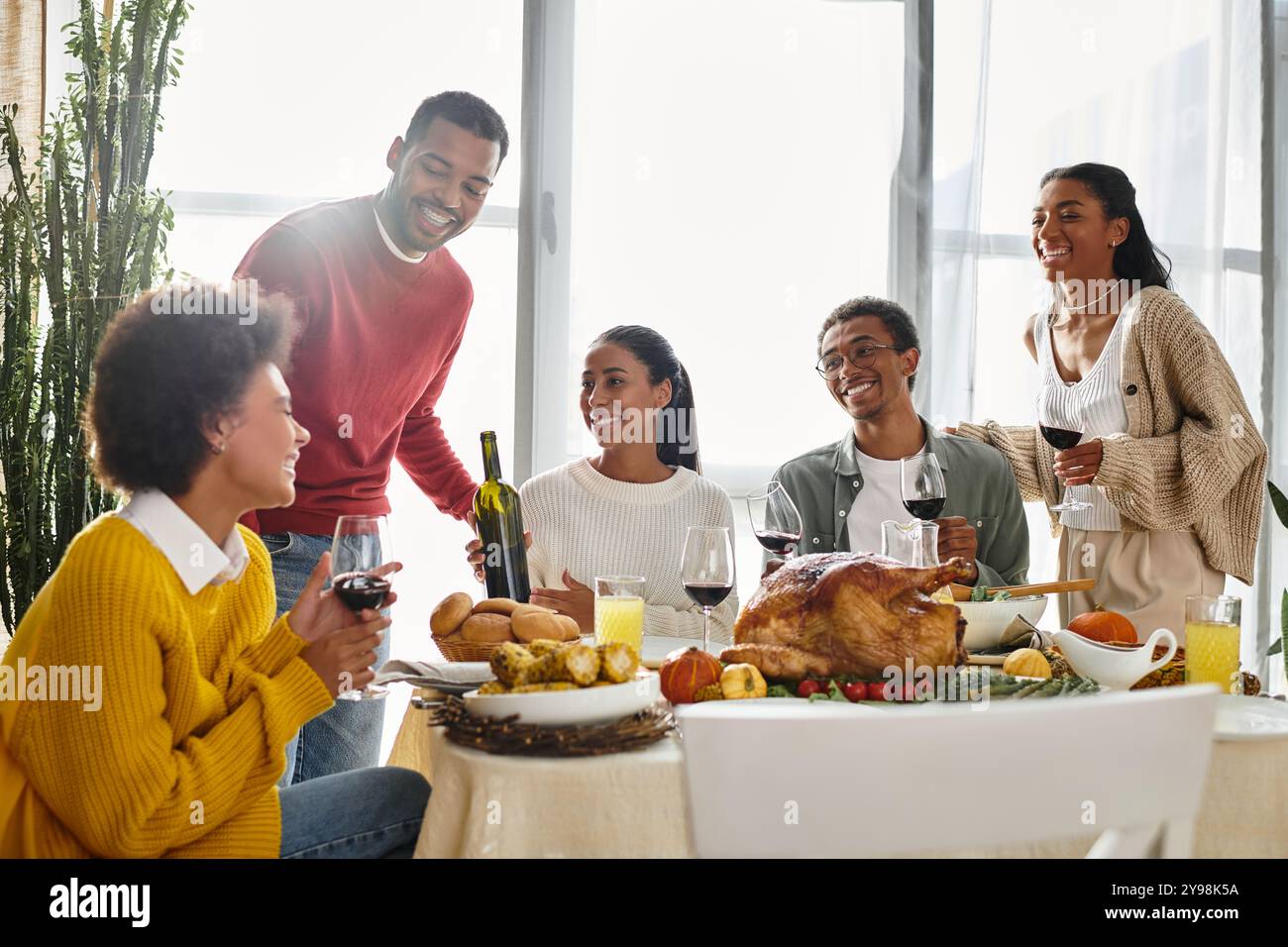 Family bonding over dinner hi-res stock photography and images - Alamy