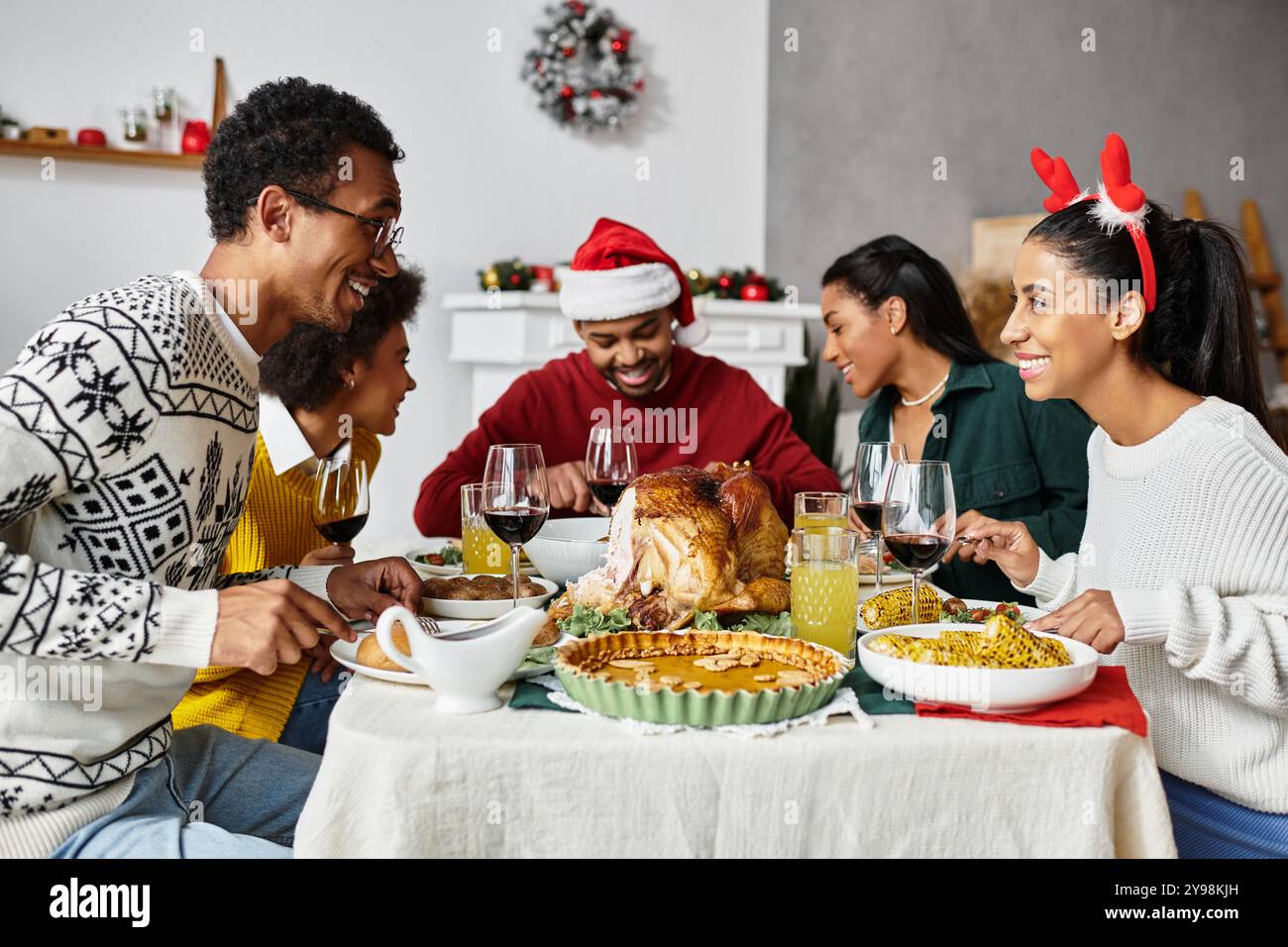 Lively gathering around table hi-res stock photography and images - Alamy