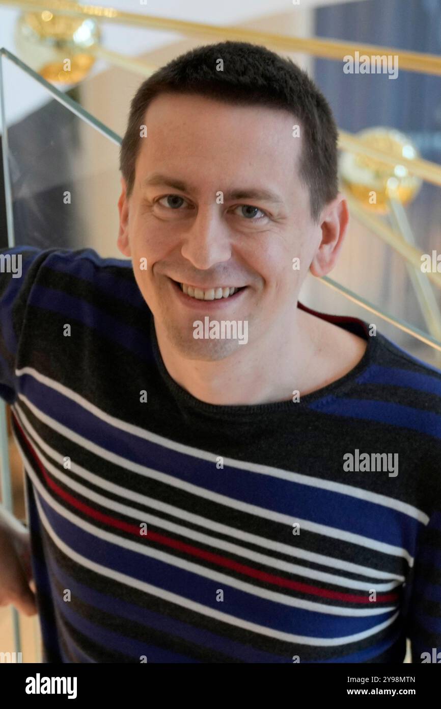Researcher John Jumper poses for a photo at the Google DeepMind offices ...