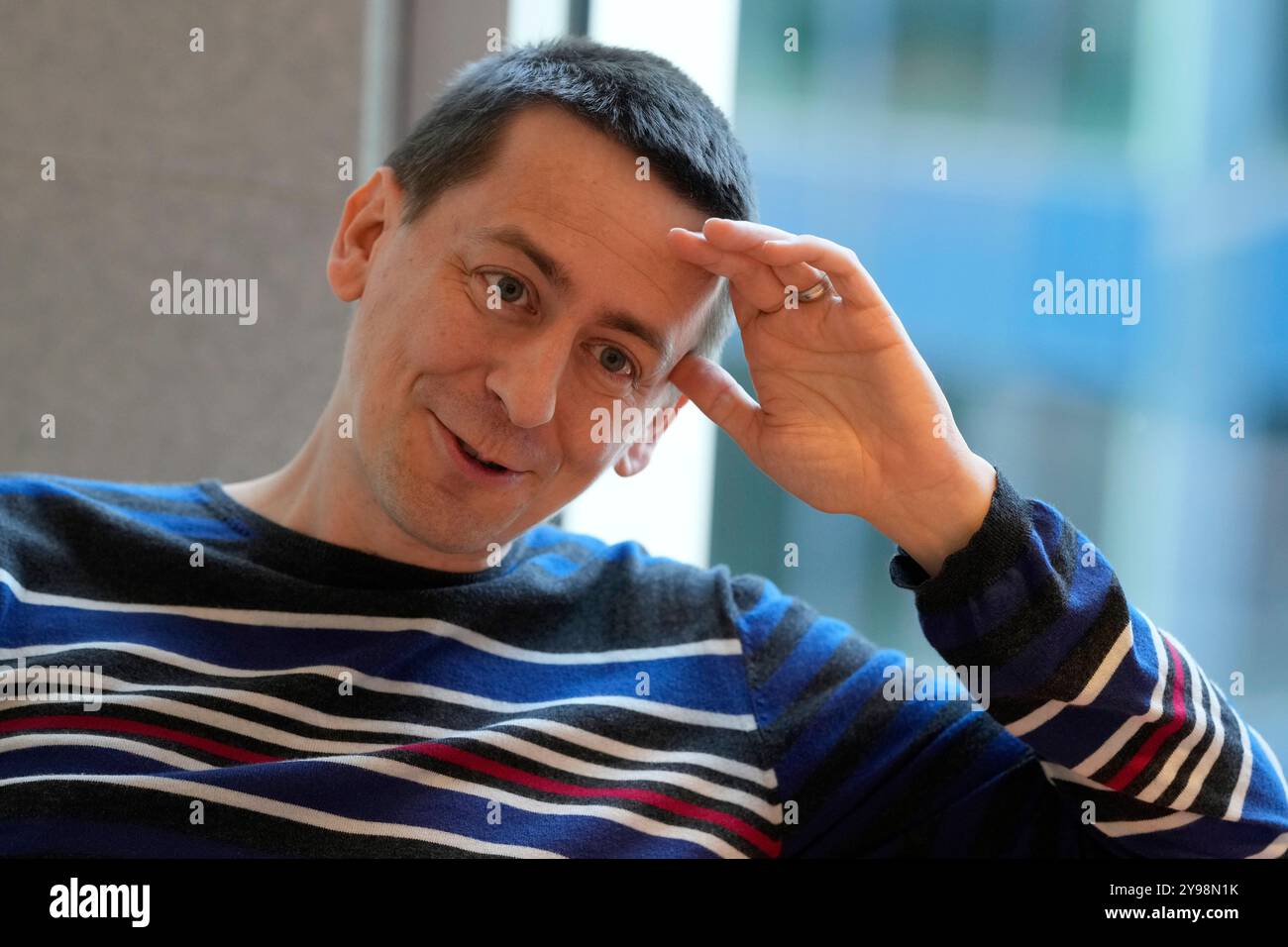 Researcher John Jumper poses for a photo at the Google DeepMind offices ...