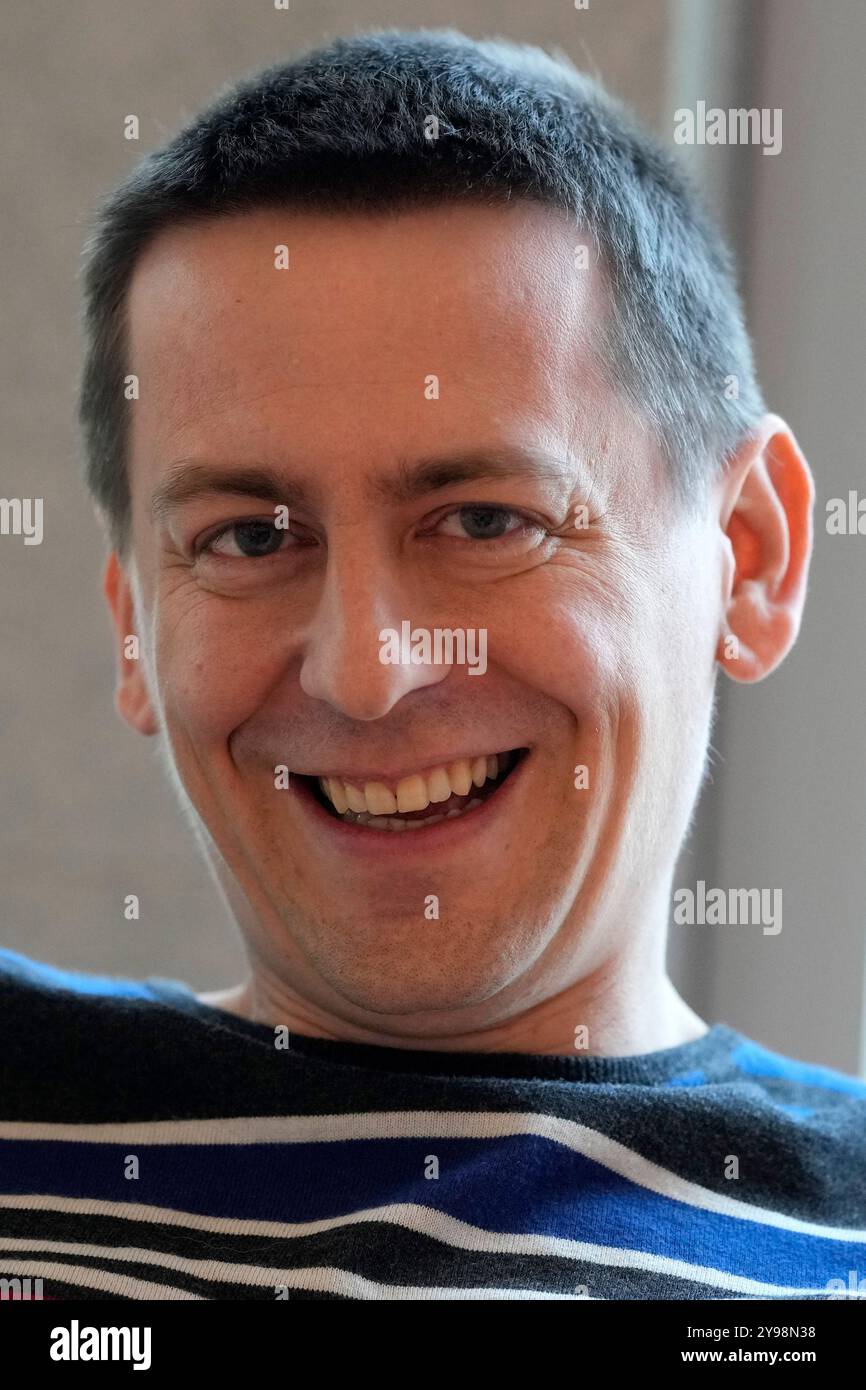 Researcher John Jumper poses for a photo at the Google DeepMind offices ...