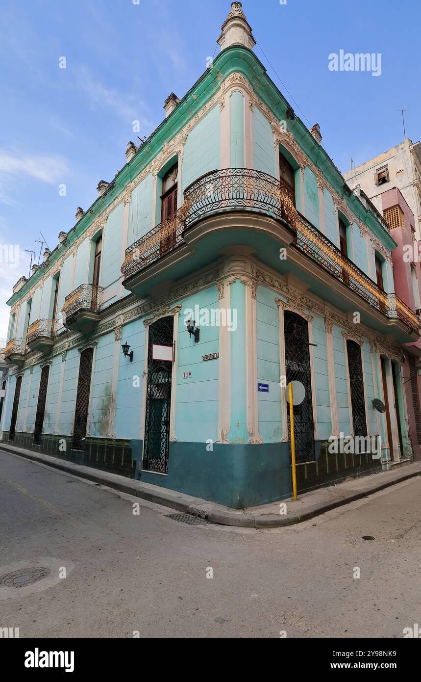 781 Eclectic building from the early 1900s painted mint-green and teal ...