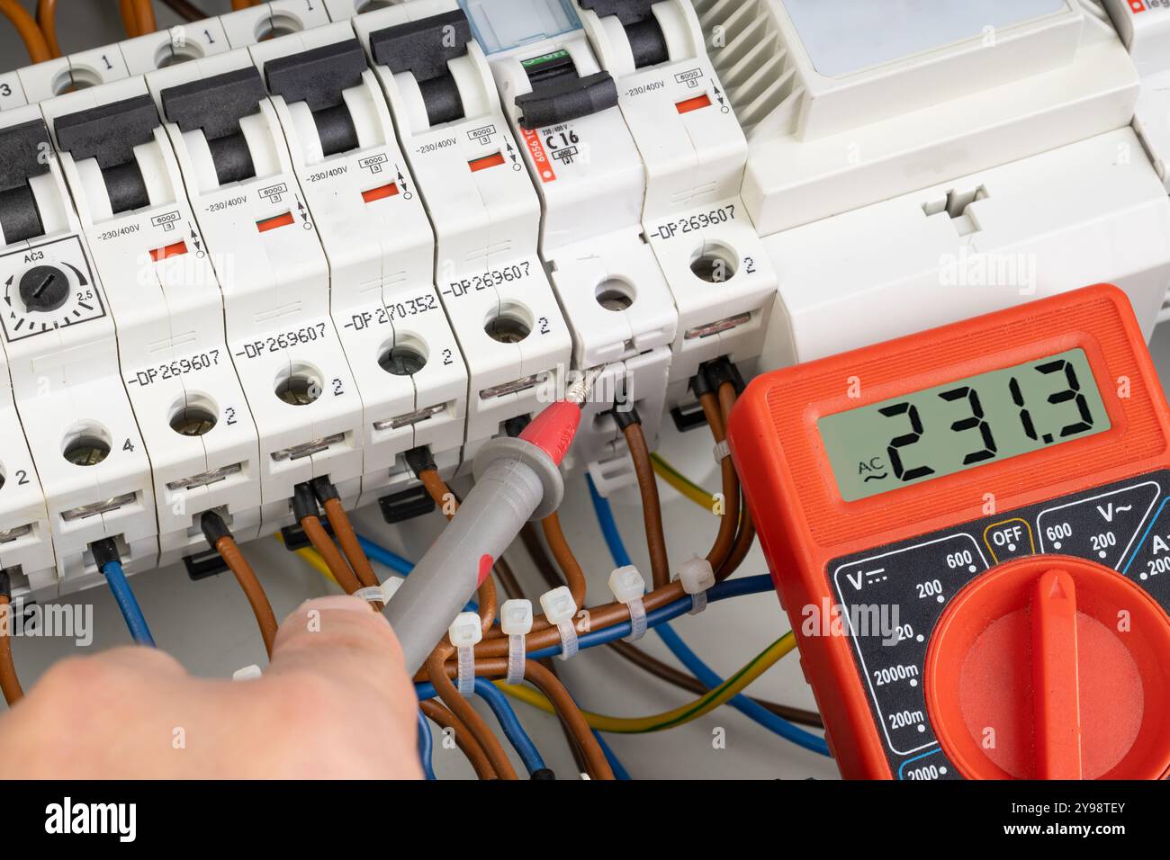 Electrical Circuit Breaker Testing with Digital Multimeter Stock Photo ...