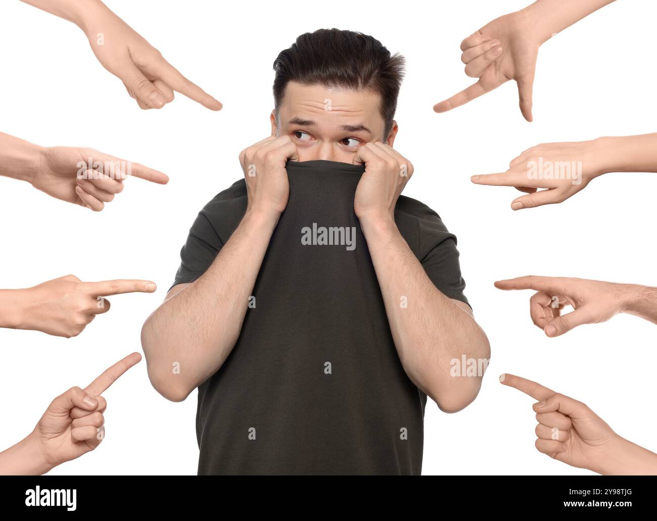 People pointing at embarrassed man on white background Stock Photo - Alamy