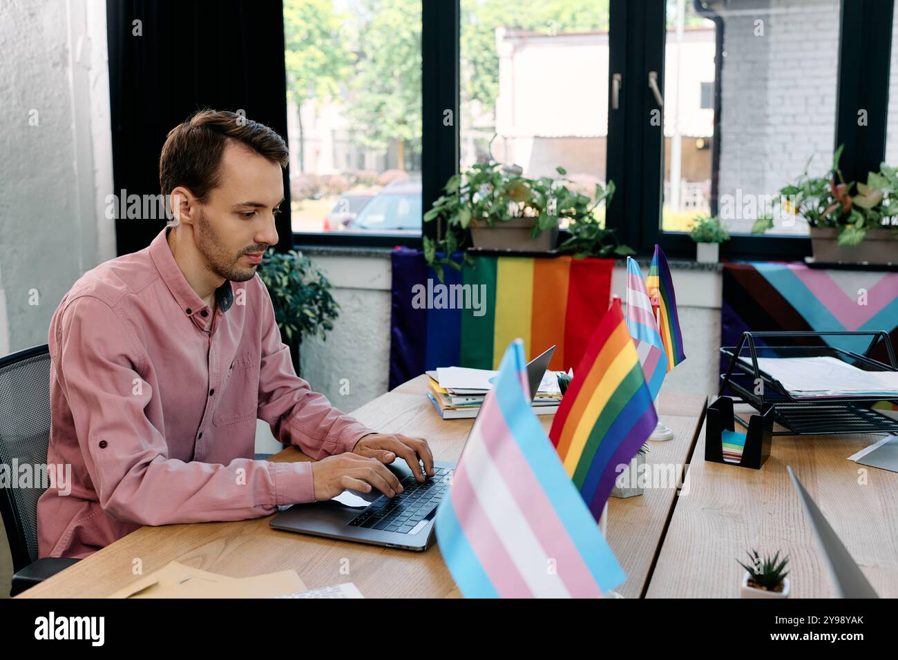 Dedicated stylish man working hard in his office Stock Photo - Alamy