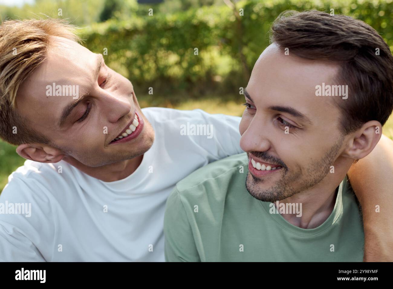 A joyful moment unfolds as a couple shares smiles, warmth, and ...