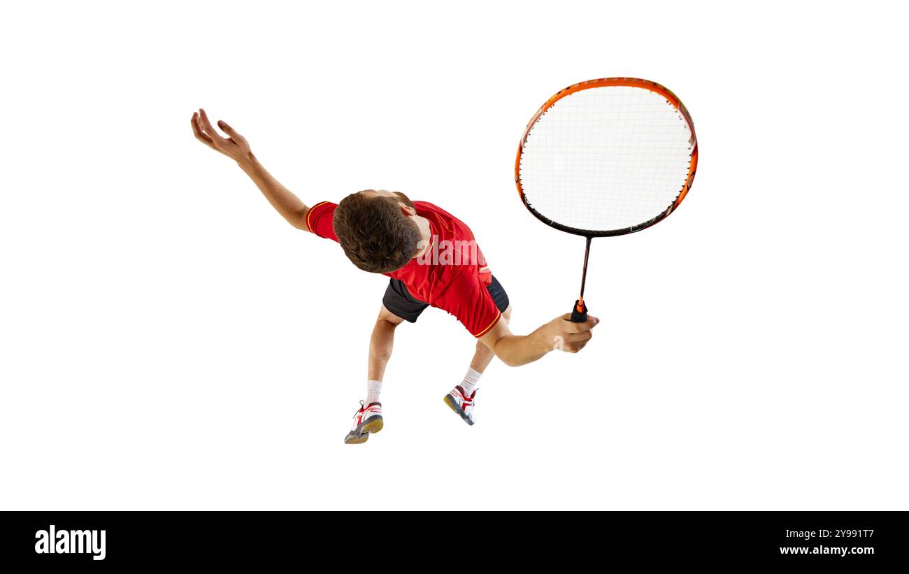 Aerial view of badminton player swinging racket with full force ...