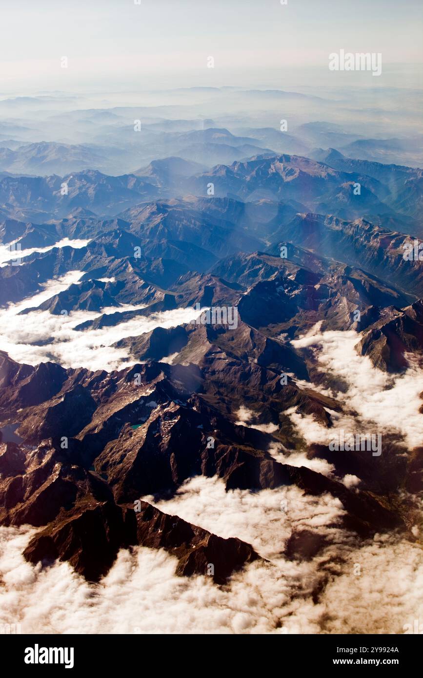 The breathtaking view captures the Pyrenees mountains under a layer of ...