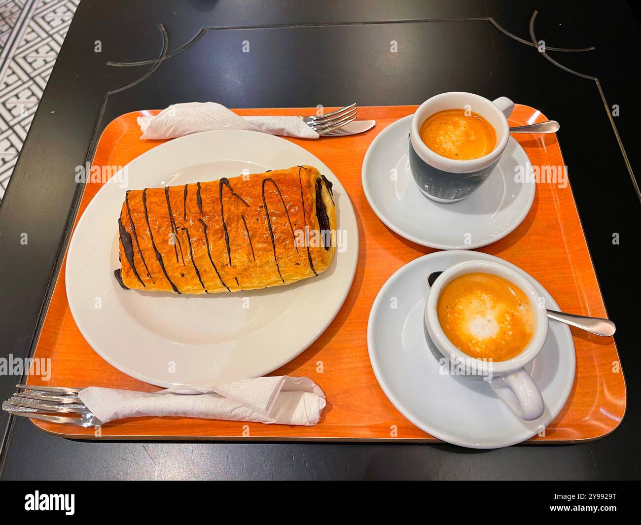 Two cups of coffee with puff pastry cake Stock Photo - Alamy