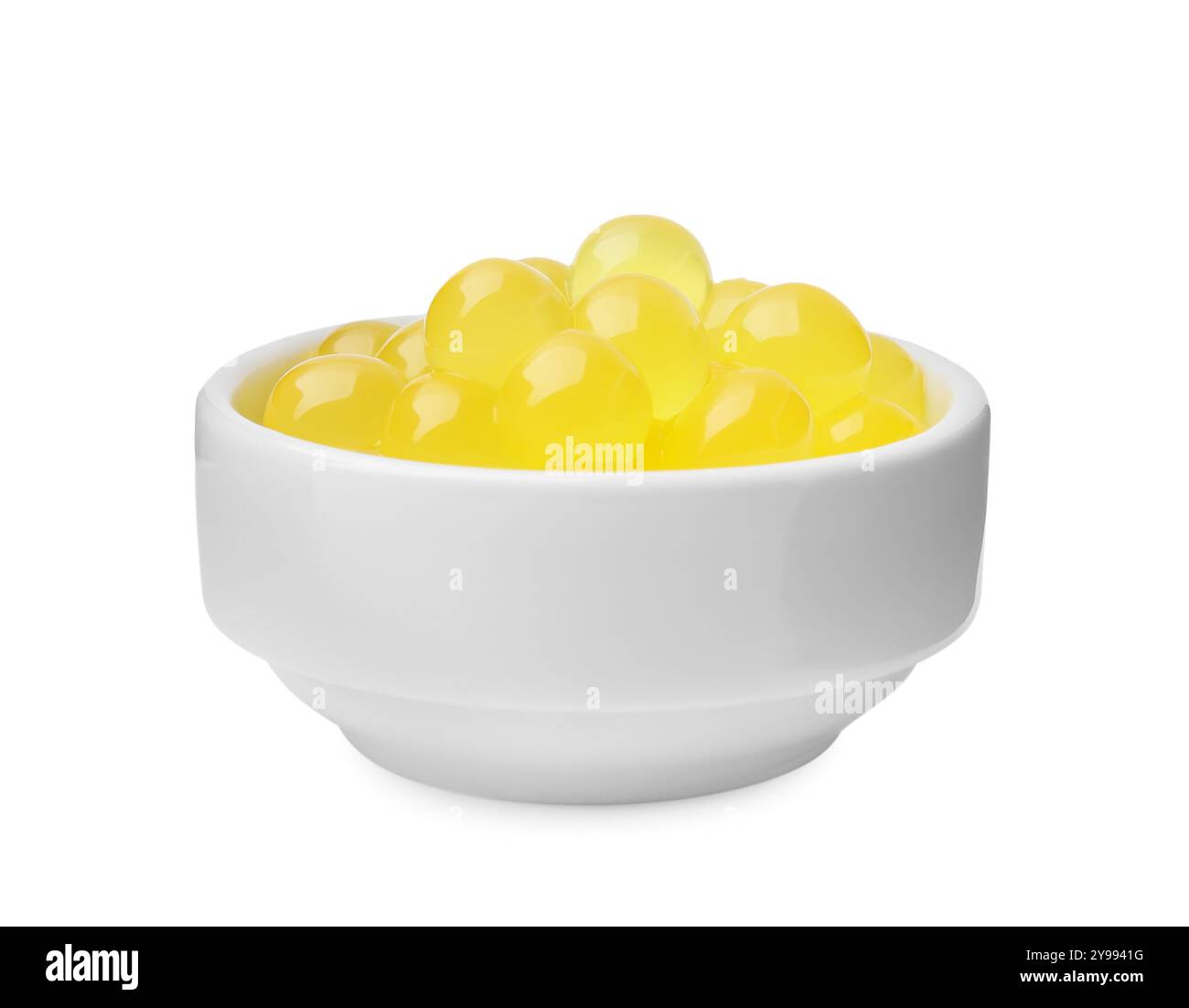Bright tapioca pearls in bowl isolated on white Stock Photo - Alamy