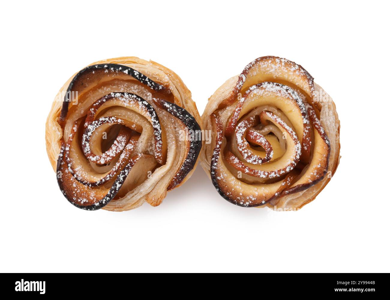 Freshly baked apple roses isolated on white, top view. Puff pastry ...