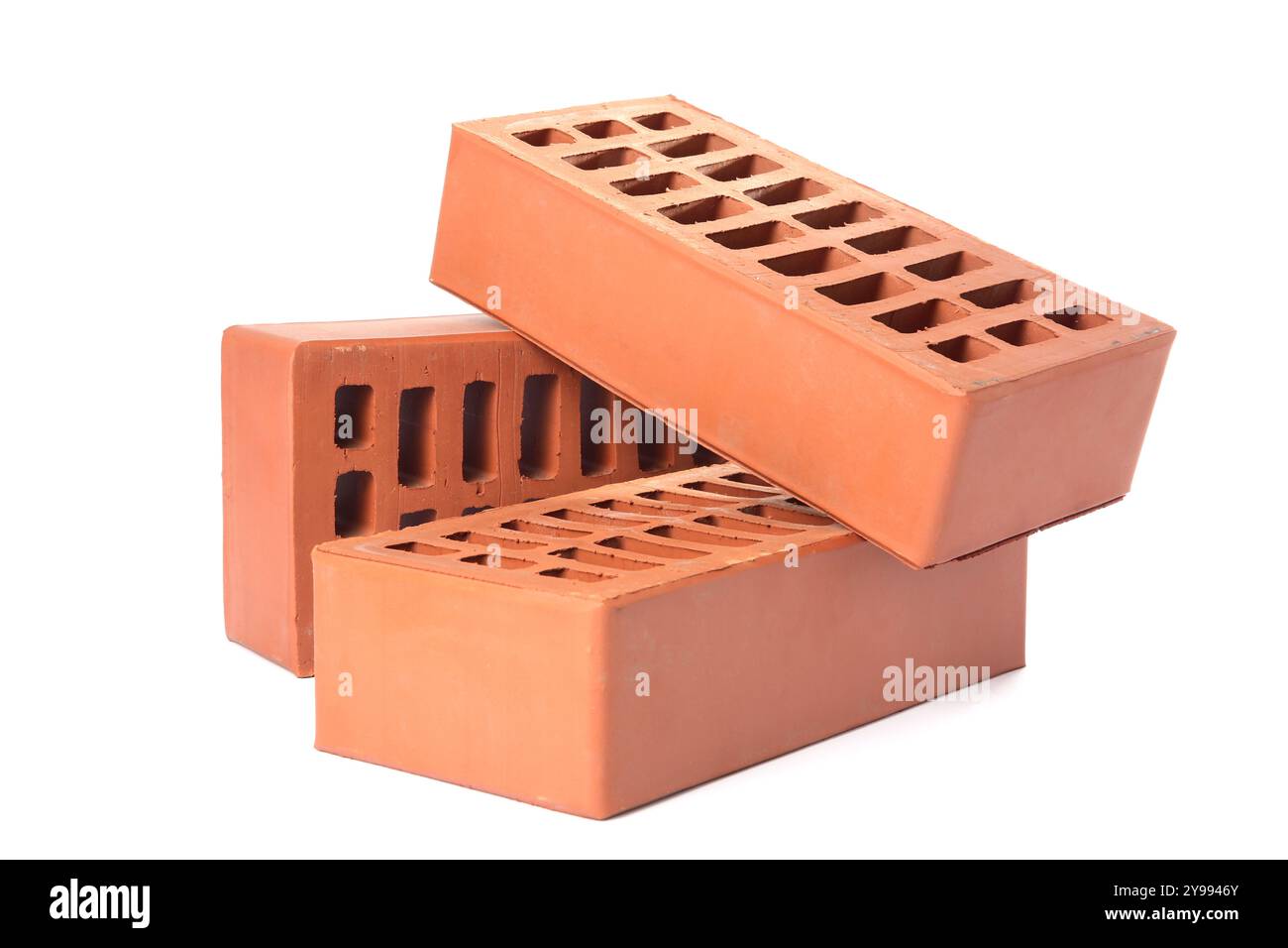 Red bricks isolated on white. Building material Stock Photo - Alamy
