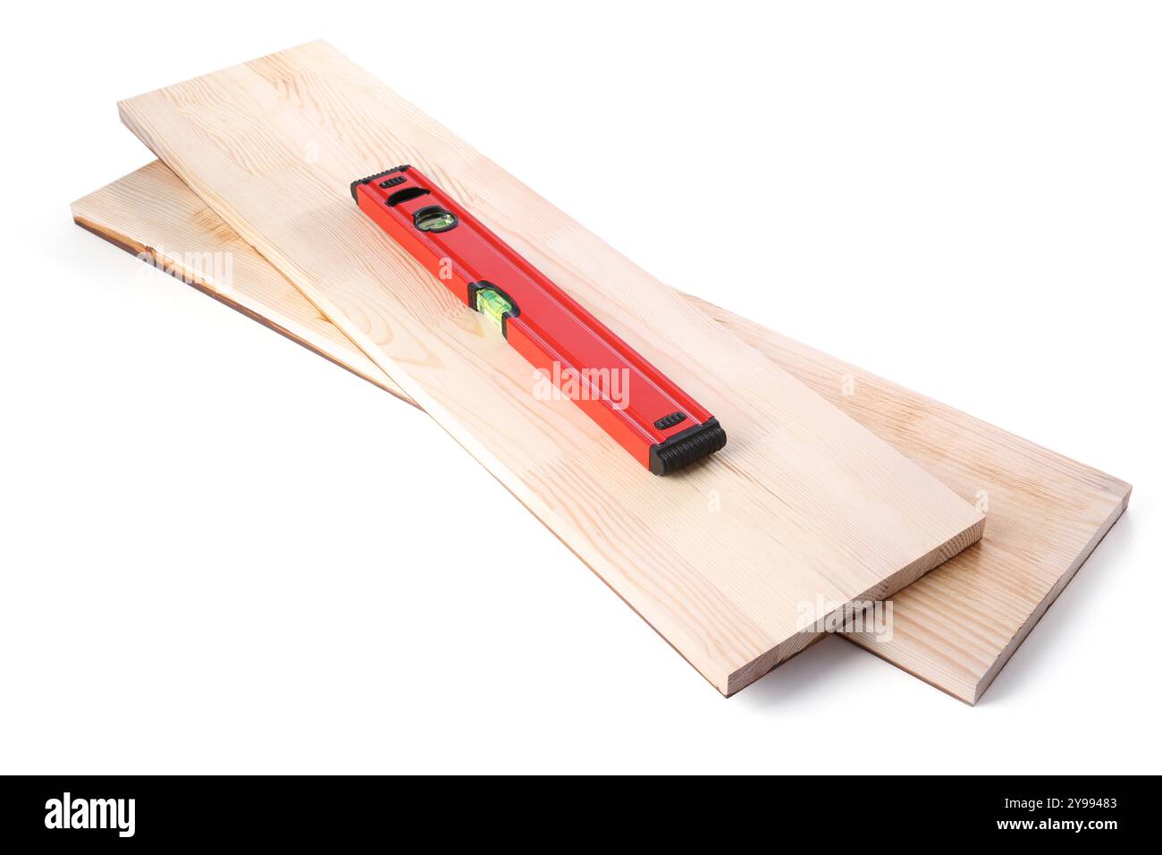 Wooden planks and building level isolated on white. Construction tools ...