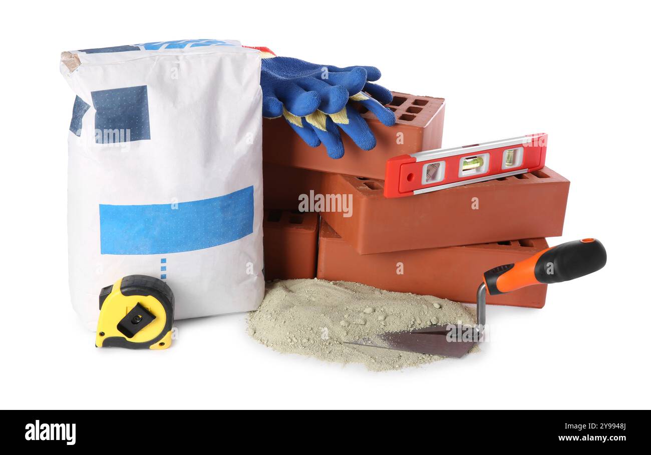 Different building materials and construction tools isolated on white ...