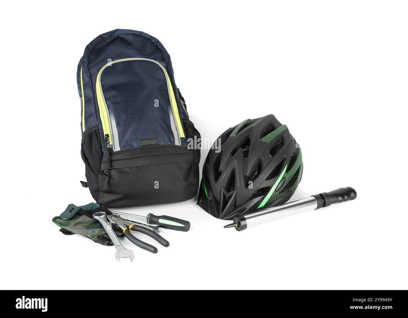Bicycle helmet, backpack, fingerless gloves and tools isolated on white ...