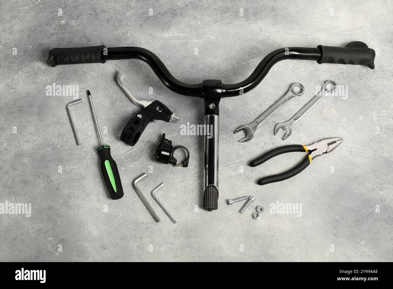 Parts of bicycle and tools on grey background, flat lay Stock Photo - Alamy
