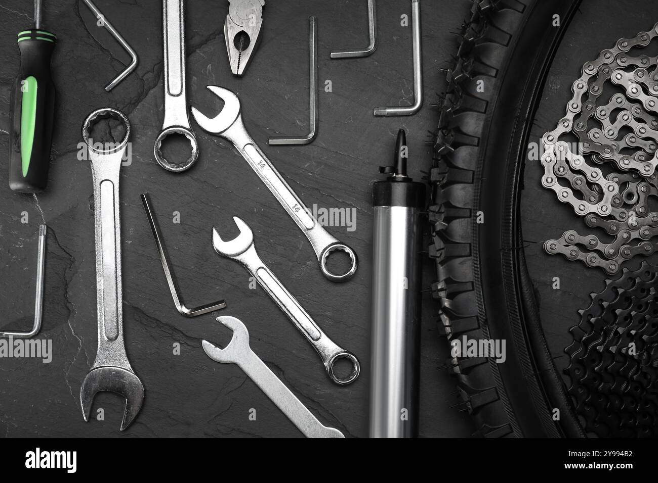 Parts of bicycle and tools on black table, flat lay Stock Photo - Alamy