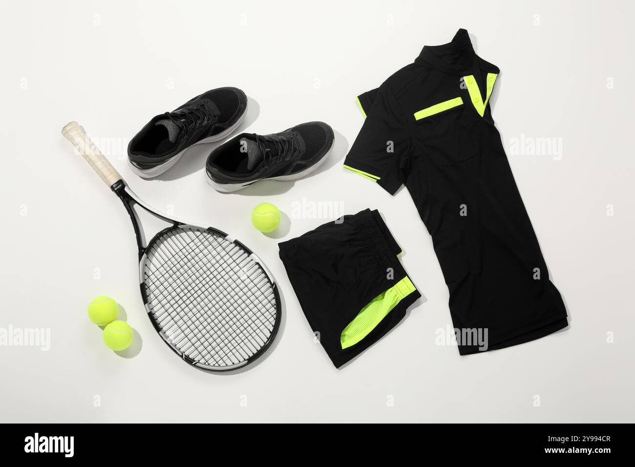Tennis racket, balls and sportswear on white background, flat lay Stock ...