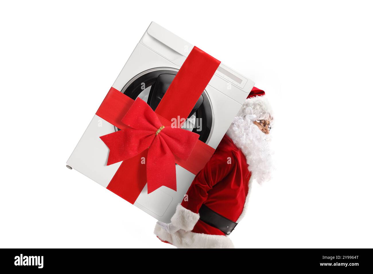 Santa claus carrying a wrapped washing machine with a ribbon on his ...
