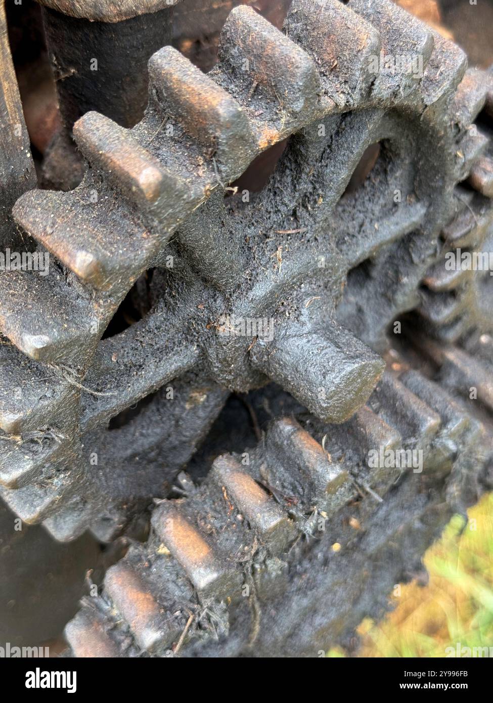 Transmission mechanism of a manual animal feed grinder. Gears of an old ...