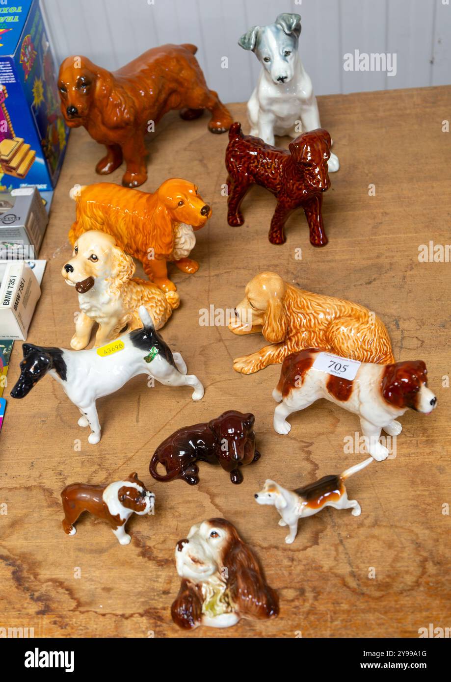 Variety of China dog models of different breeds on display as a lot in ...