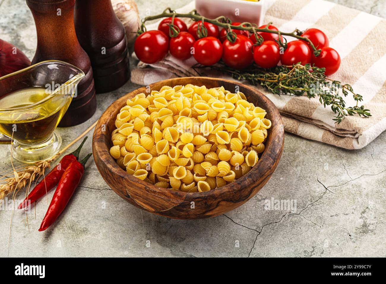 Italian cuisine - dry conchiglie shell pasta Stock Photo - Alamy