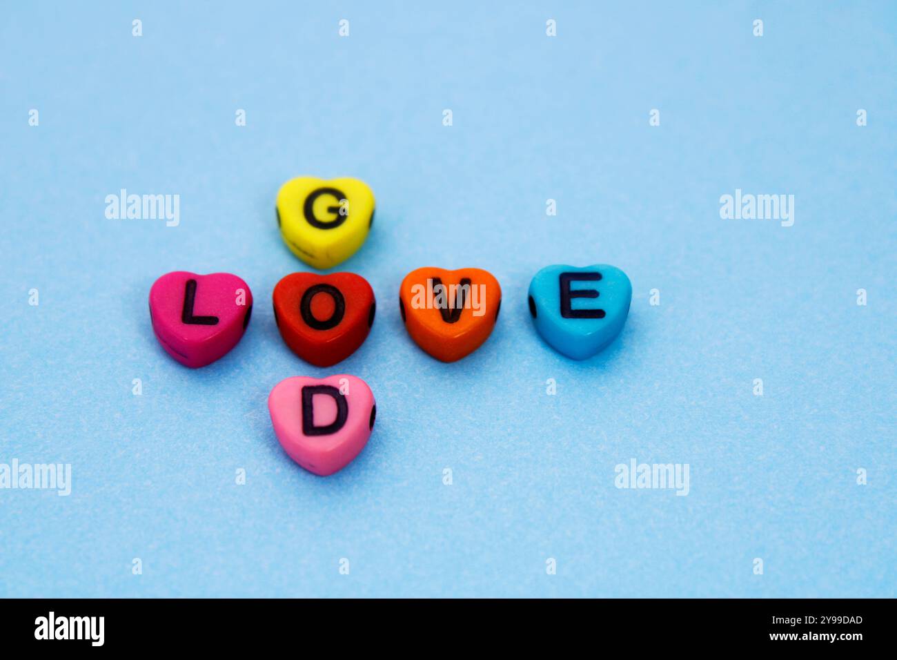 Heart shaped beads that express love for God Stock Photo - Alamy