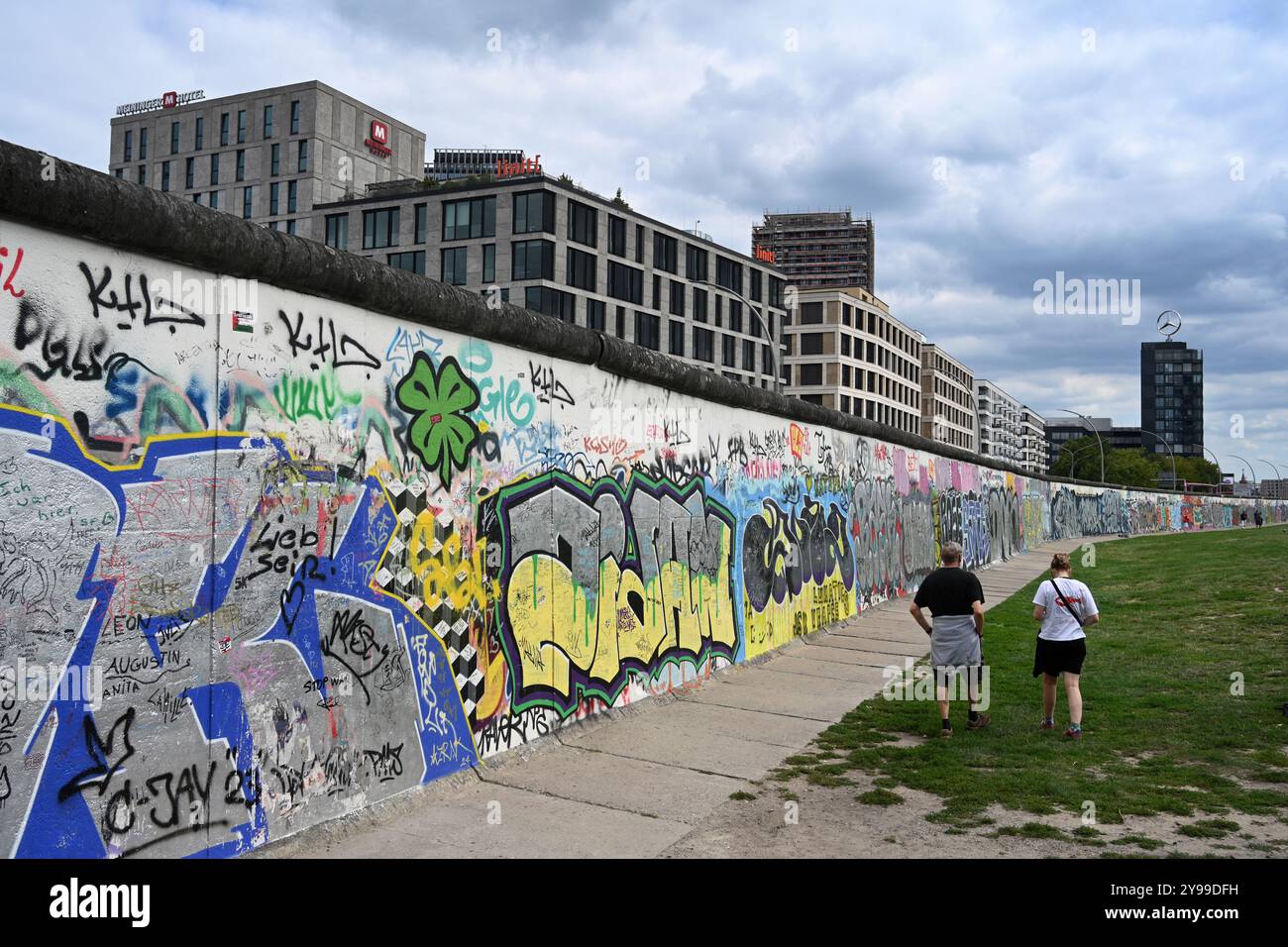 Berlin, Germany - August 3, 2024: A people near the East Side Gallery ...