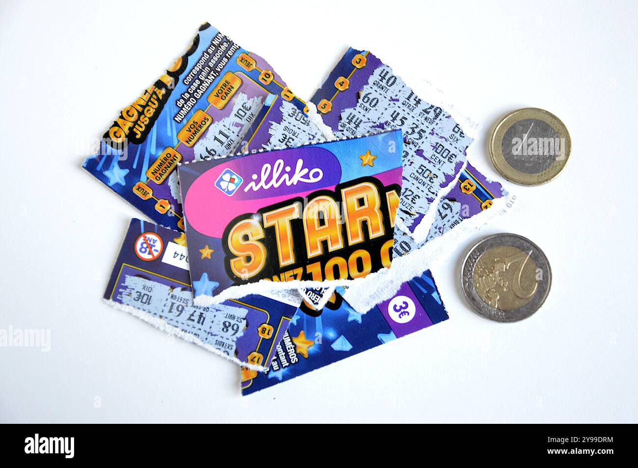 In this photo illustration, a Star Max scratch card played and torn ...