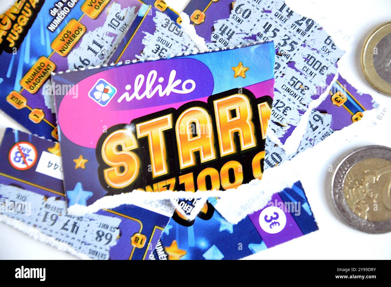 In this photo illustration, a Star Max scratch card played and torn ...