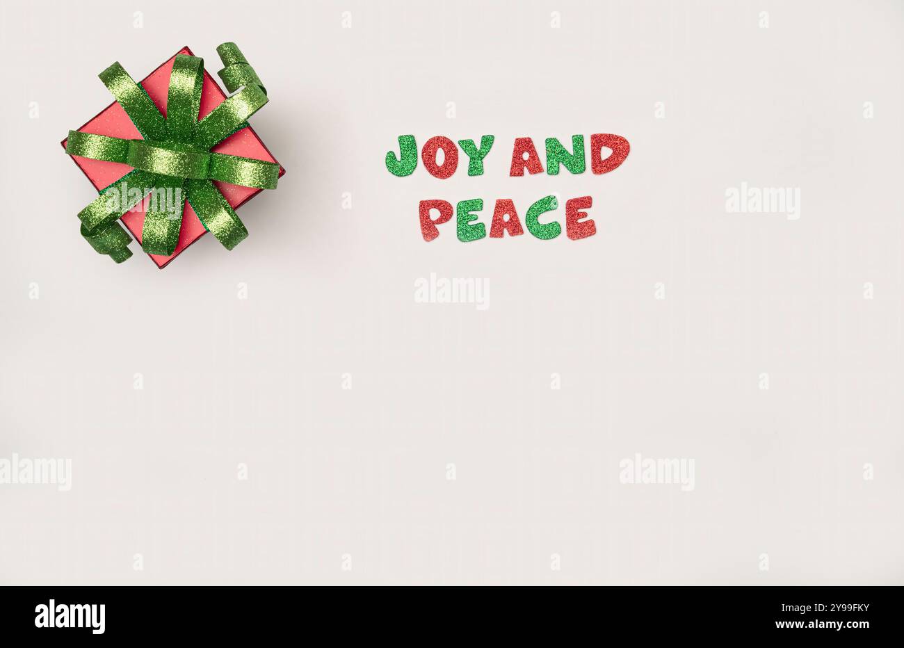 Joy and peace statement with gift package on a white backgraound Stock ...