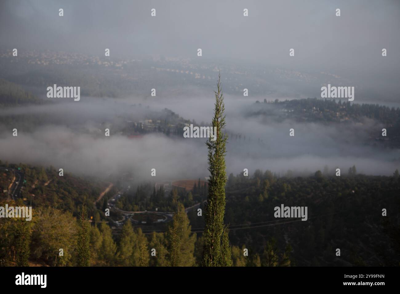 Heavy fog looking like an ocean covering Ein Karem where John the ...