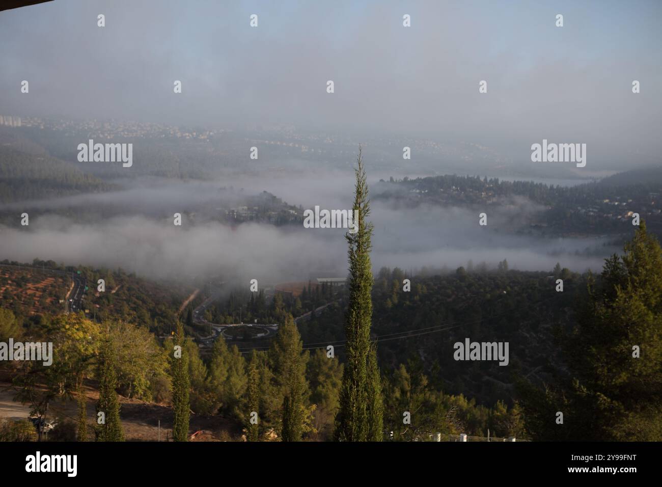 Heavy fog looking like an ocean covering Ein Karem where John the ...