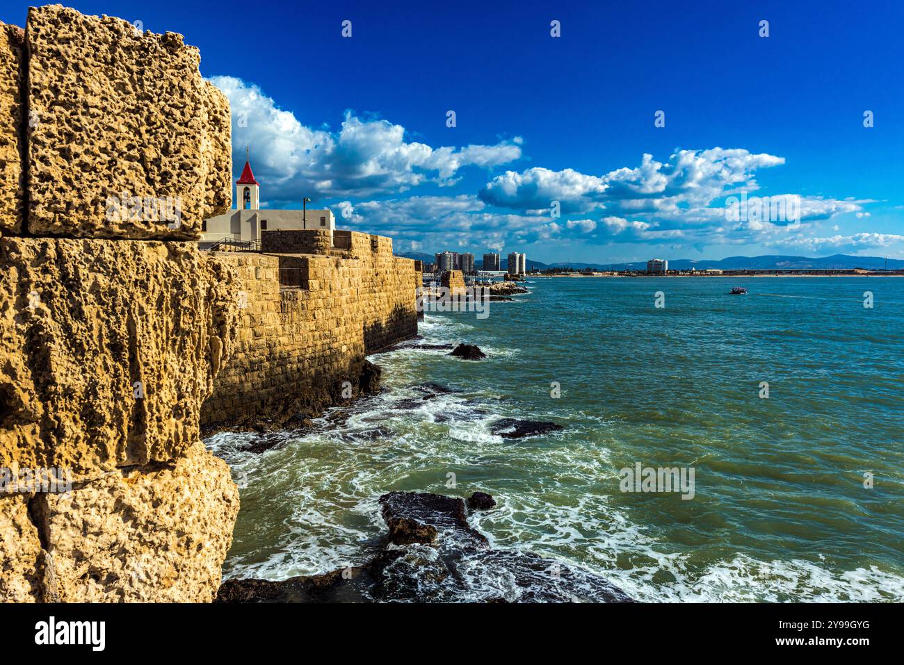 Fortification wall of the port city Akko and St. John church in the ...