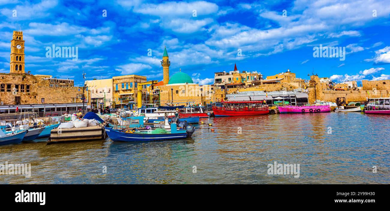 View on marina with yachts and ancient walls of harbor in old city Acre ...