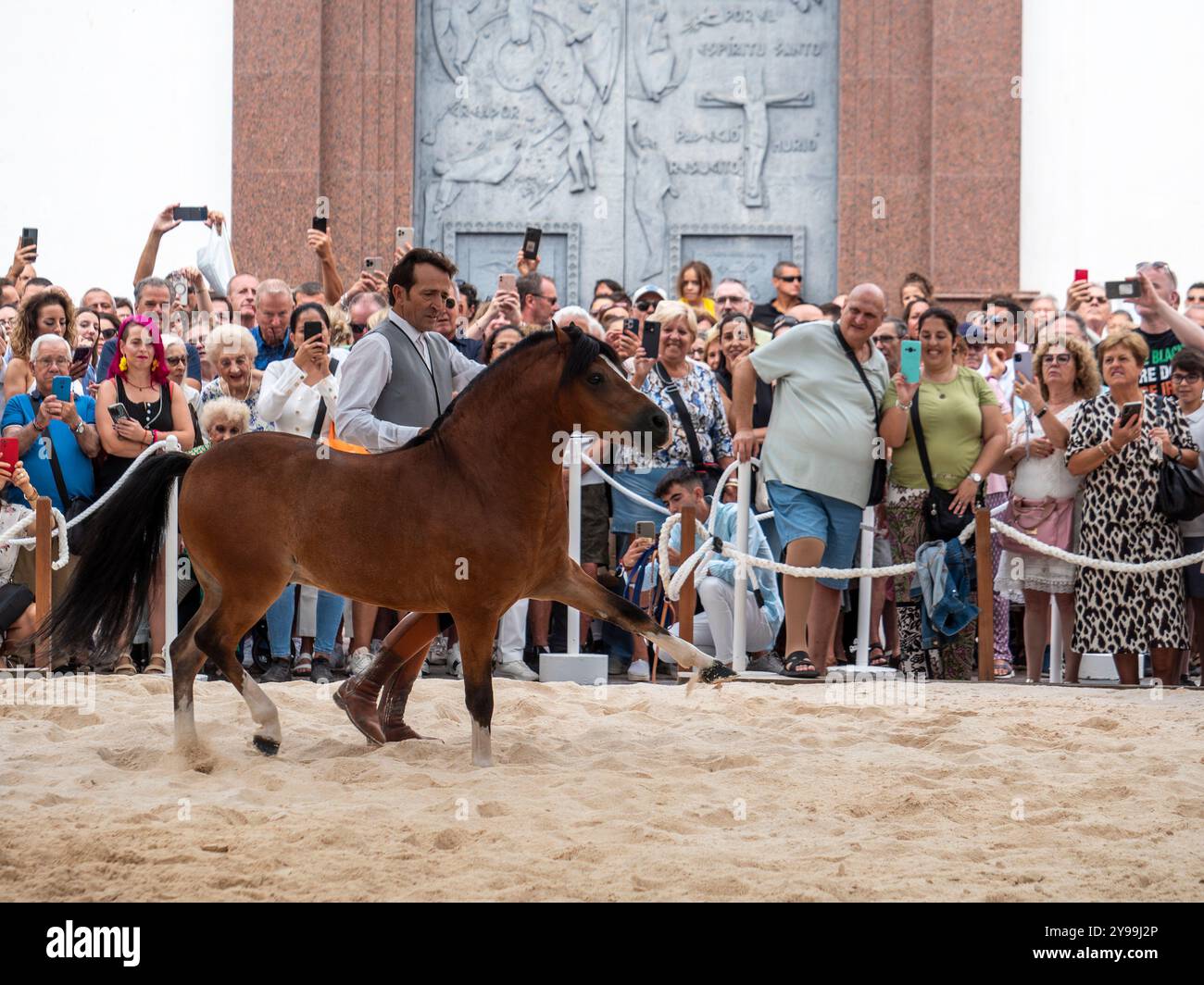 09/20/2024. Fuengirola, Malaga, Spain. Rider on foot dressed in the ...