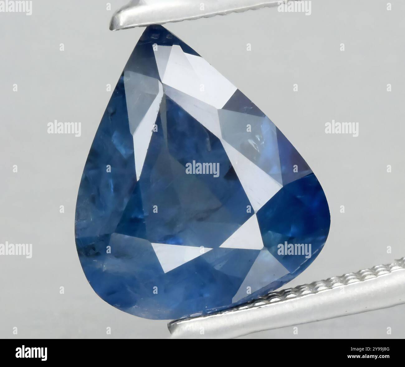 Stunning Teardrop Sapphire Gemstone Glimmering Under Light Stock Photo ...