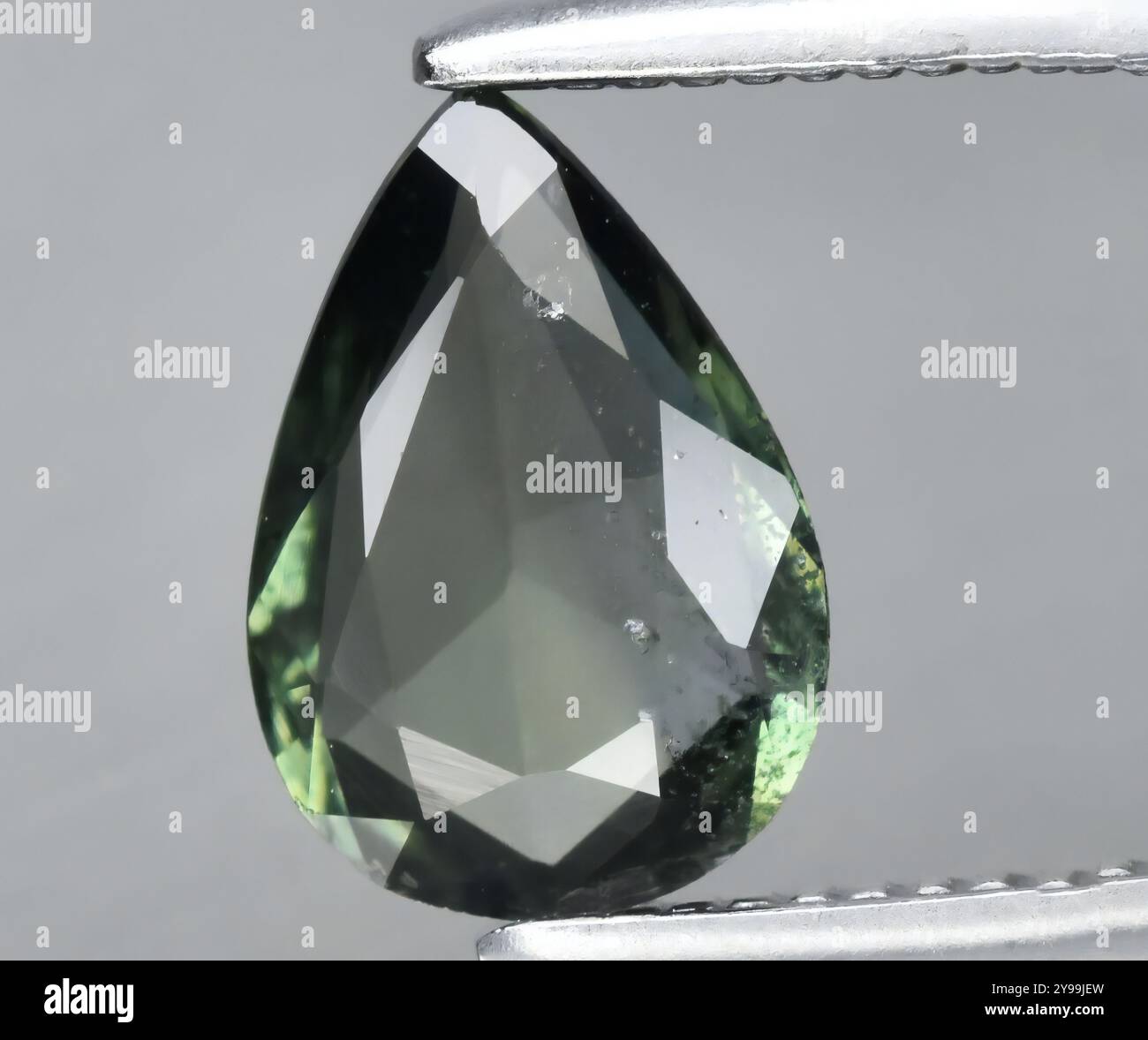 Sparkling Teardrop-Shaped Gemstone with Rich Green Undertones Stock ...