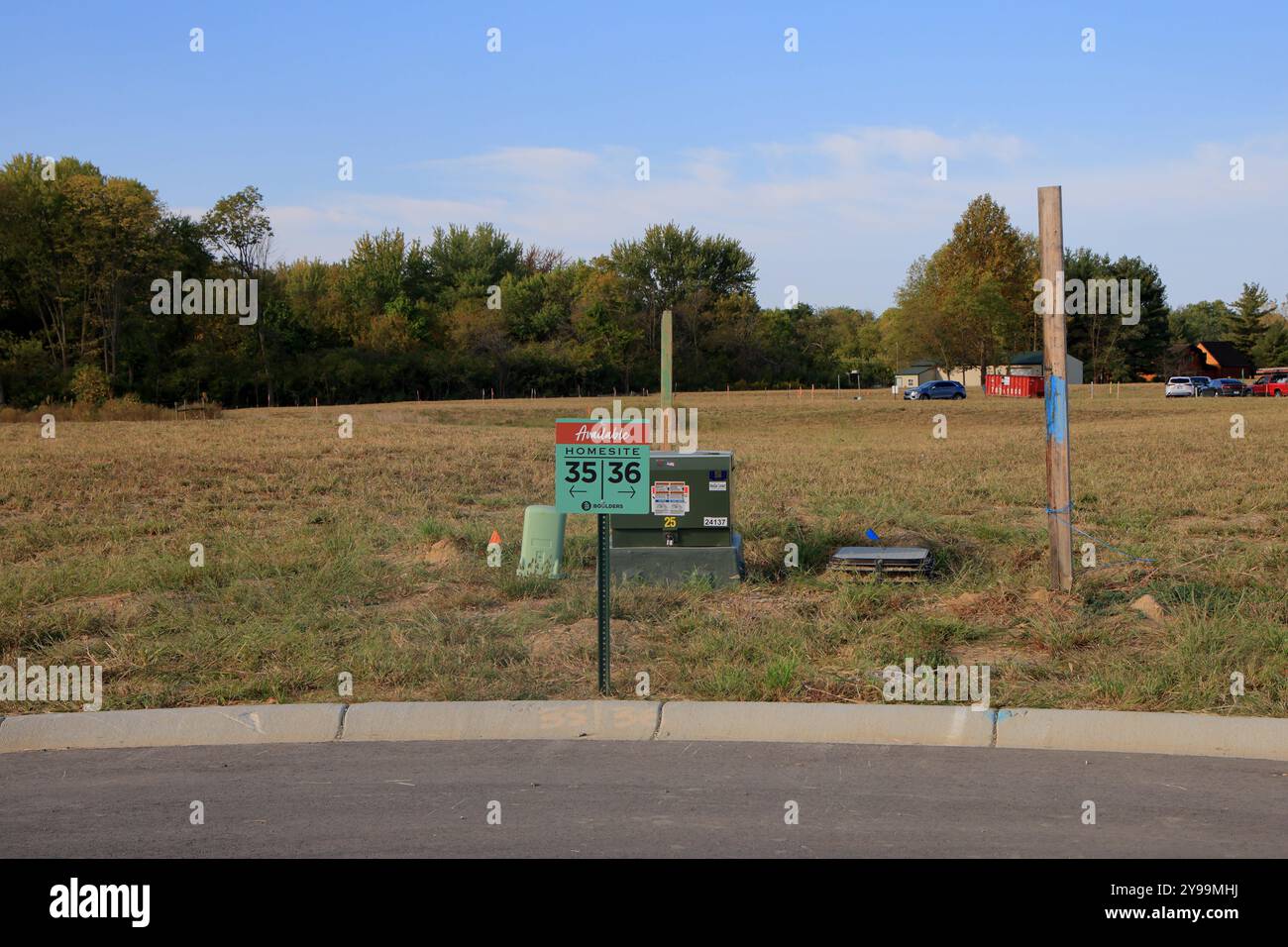 Empty, new residential housing building plot with existing and new ...