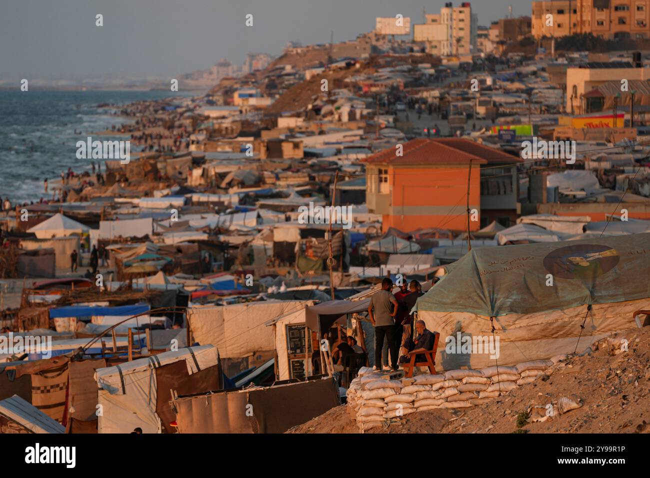 Tents are crammed together as displaced Palestinians camp along the ...