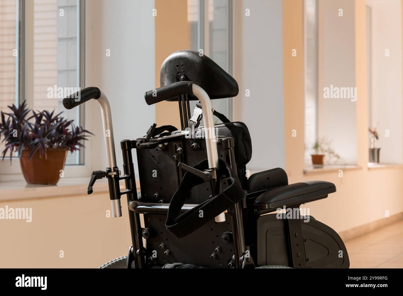 A Modern Wheelchair Resting in a Serene Indoor Space with Natural Light ...