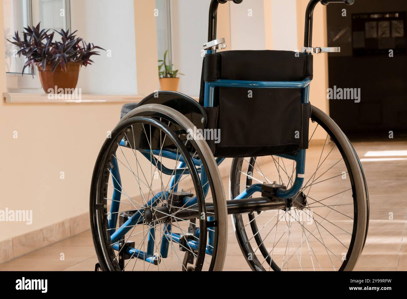 A Modern Wheelchair in a Bright and Welcoming Space Stock Photo - Alamy