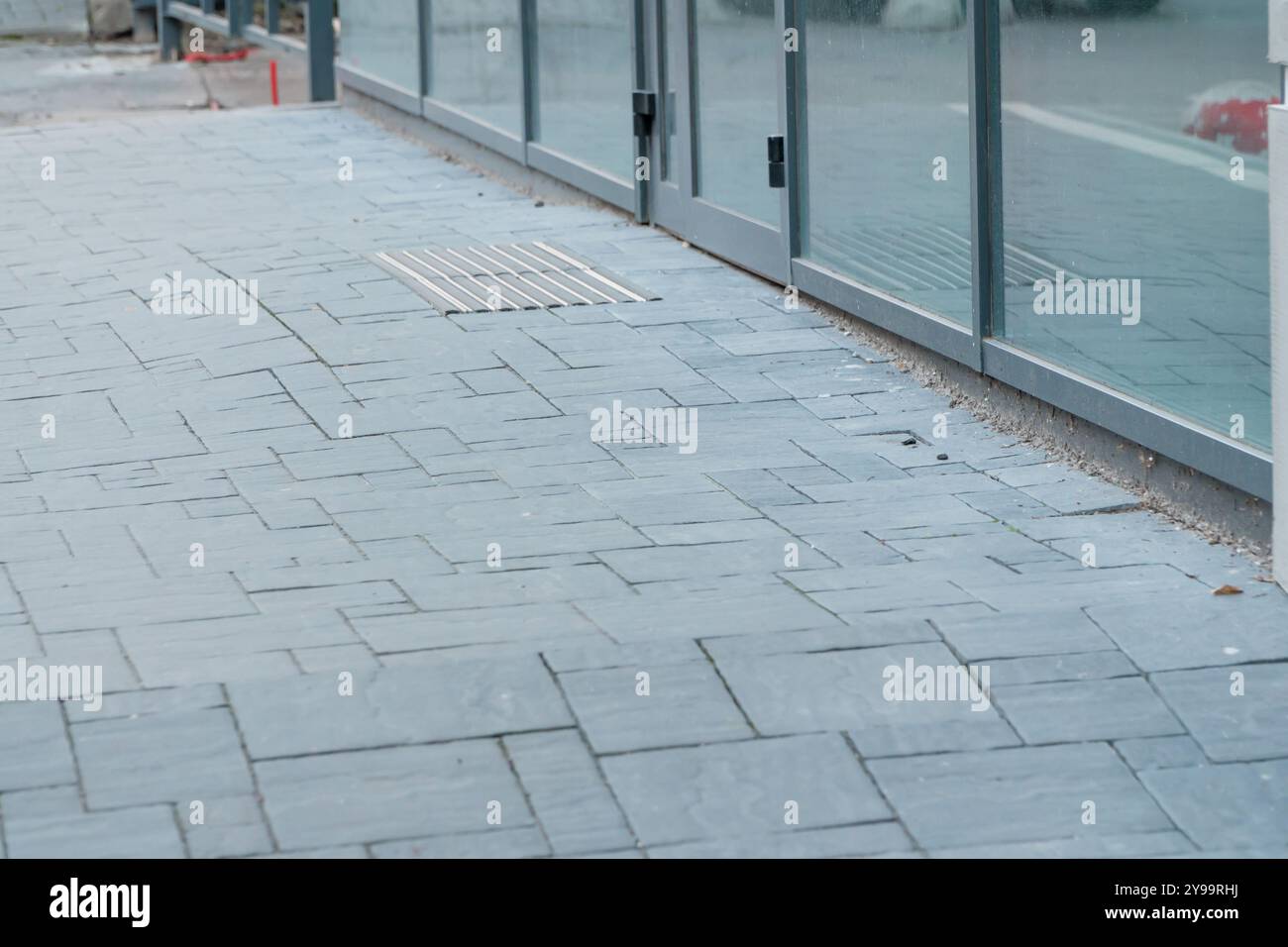 Urban Gray Paving: A Contemporary Sidewalk Atmosphere Stock Photo - Alamy