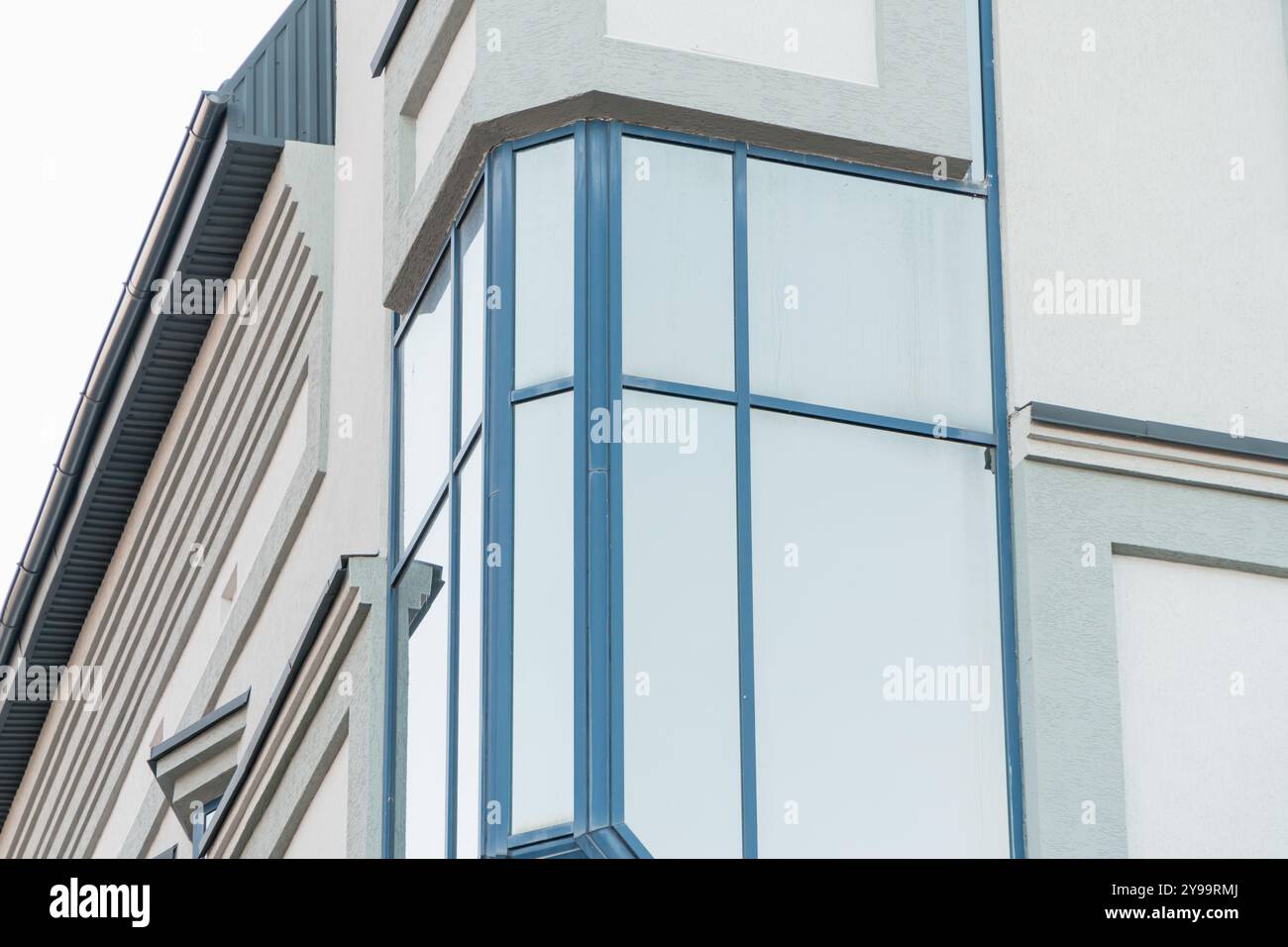 Contemporary Architectural Corner with Glass Facade and Geometric ...