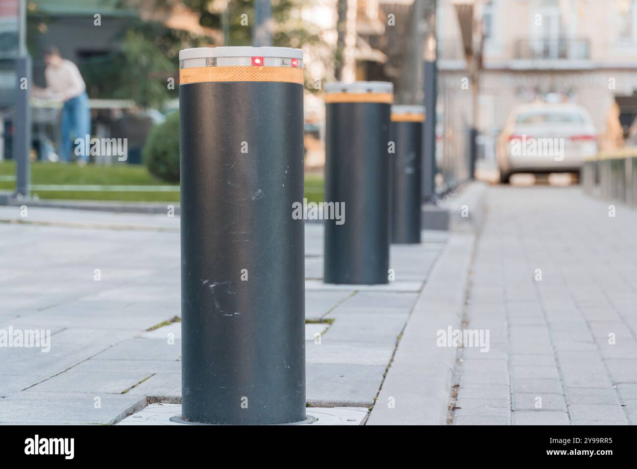Urban Security Bollards in a Modern Cityscape Stock Photo - Alamy