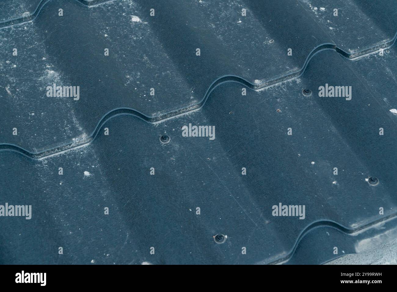 Elegant Close-Up of a Textured Metal Roof with Subtle Dust Accumulation ...