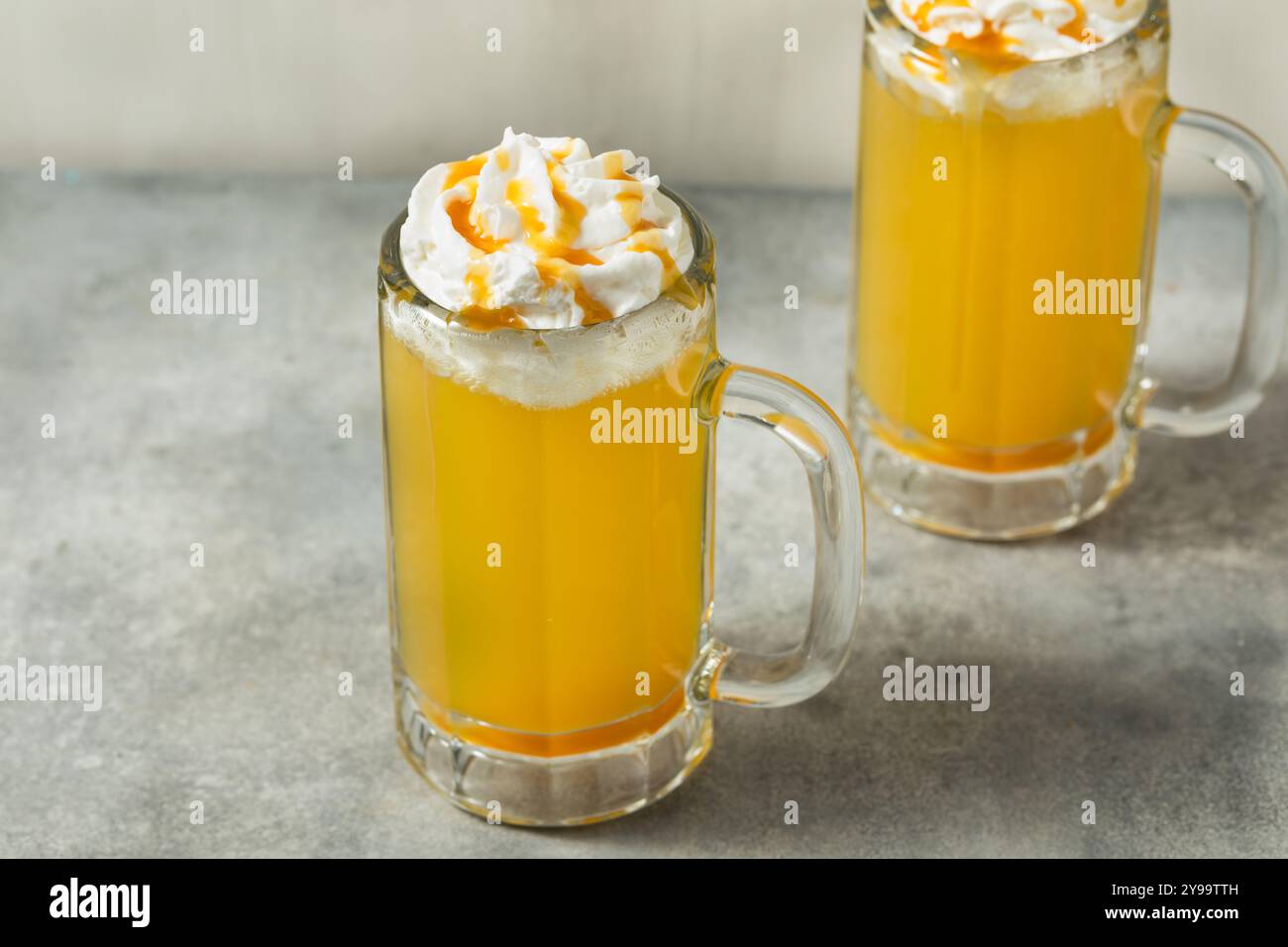 Sweet Butterscotch Butter Beer Cocktail with Whipped Cream and Syrup ...